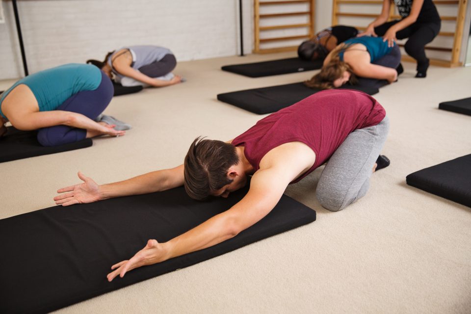 5 Exercises to Reduce Back Pain and Strengthen the Back - Bar Method